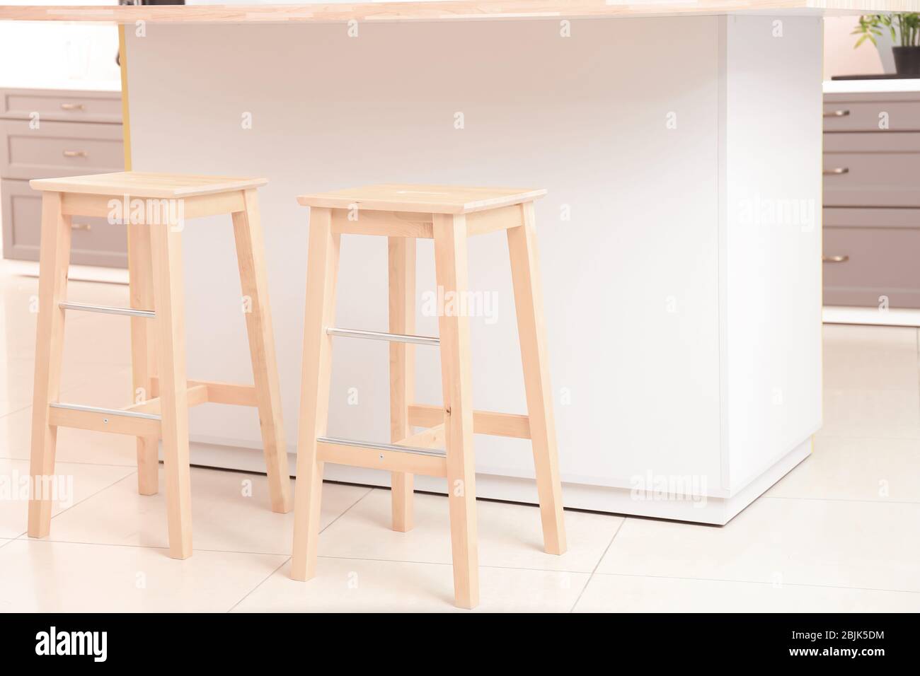 Two white stools hi-res stock photography and images - Alamy