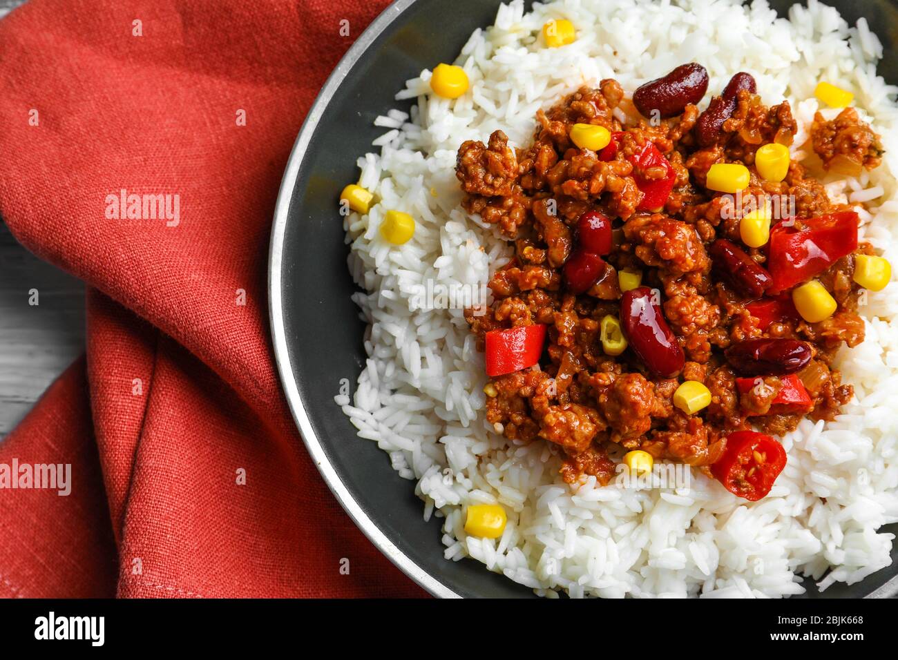 Chili Con Carne with rice on plate Stock Photo - Alamy