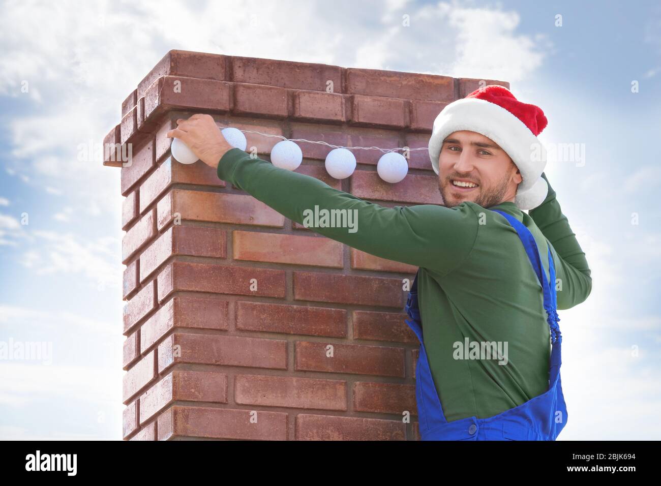 Christmas santa lights roof hi-res stock photography and images - Alamy