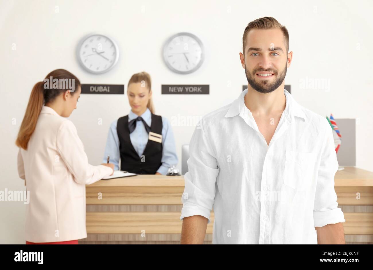 Guest man counter hi-res stock photography and images - Alamy