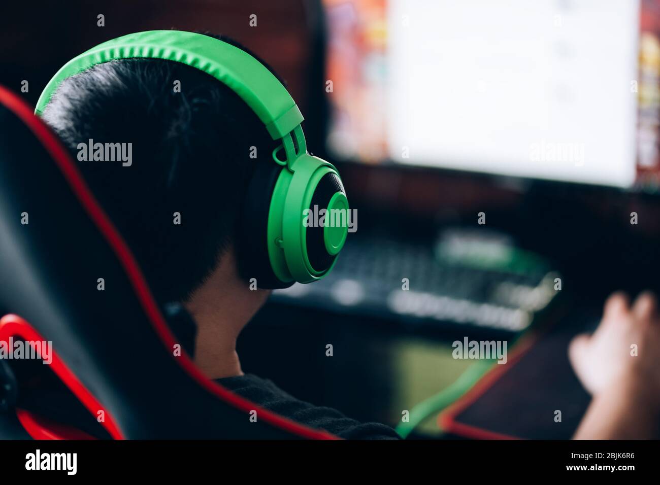 computer games, playing place, young gamer plays computer games with ...