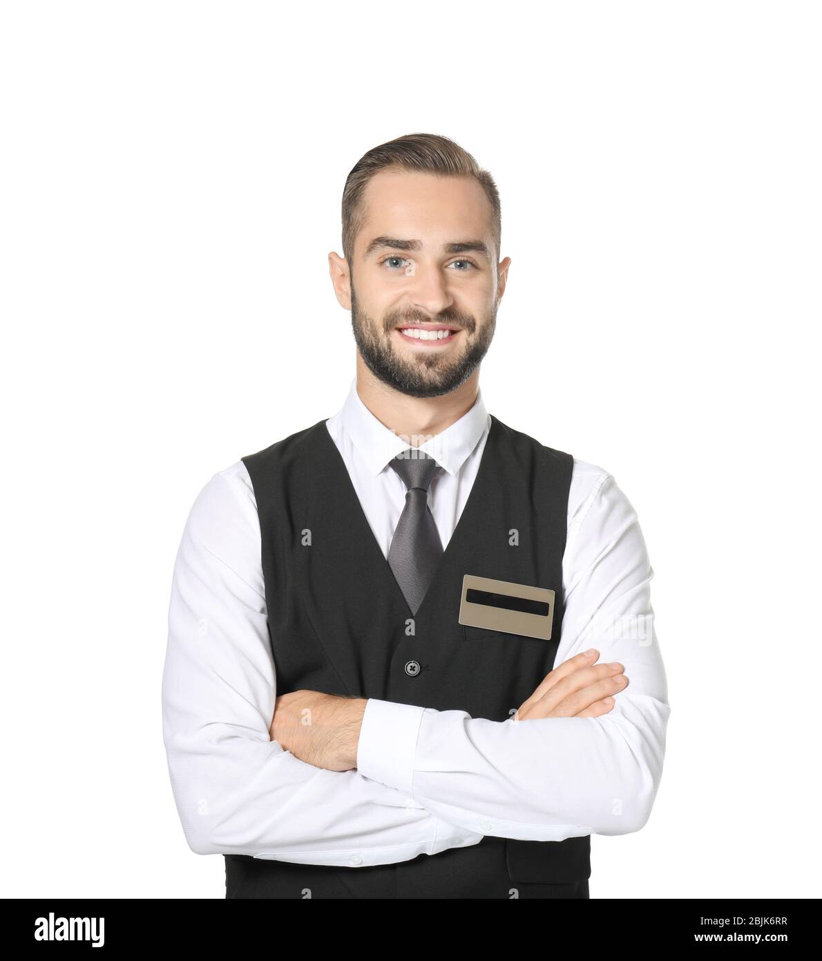 Male hotel receptionist in uniform on white background Stock Photo - Alamy