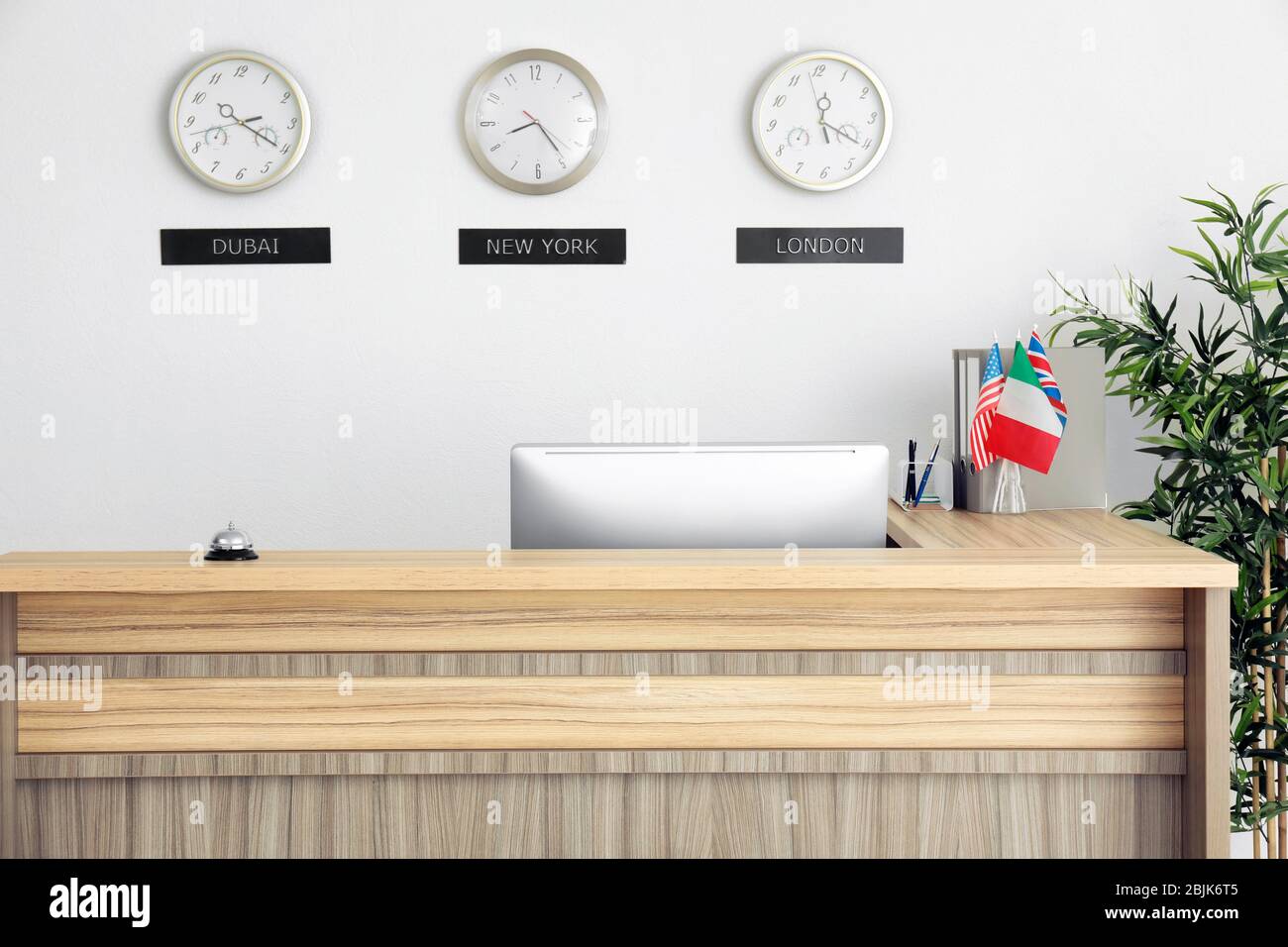 Reception desk in hotel Stock Photo - Alamy