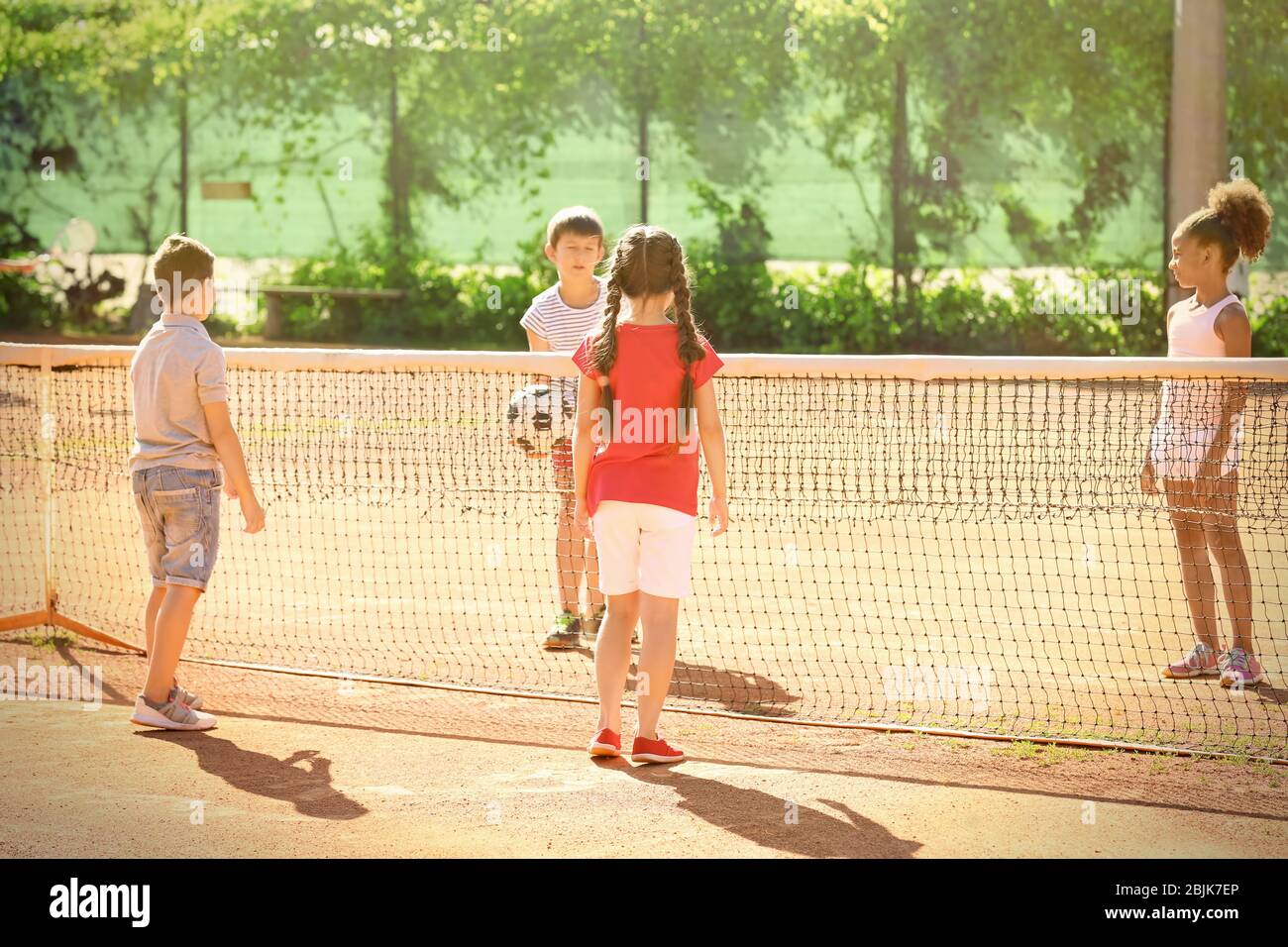 Cute children playing on sports ground outdoors Stock Photo - Alamy