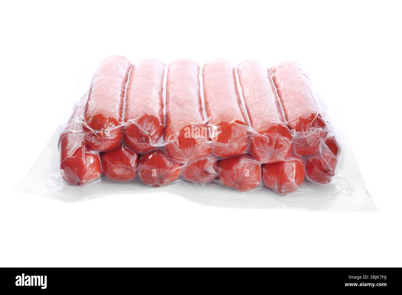 Packed sausages on white background Stock Photo - Alamy