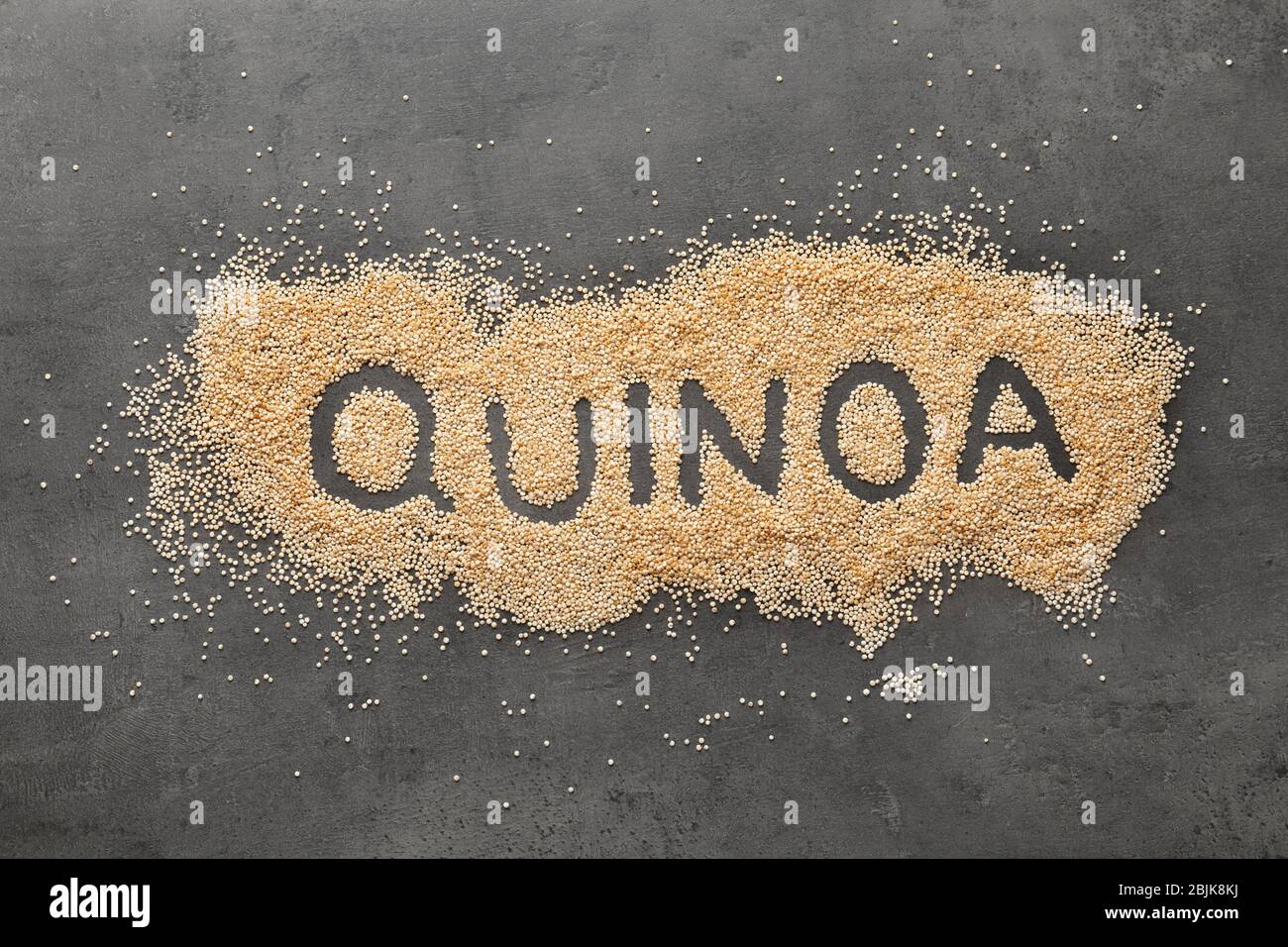 Word QUINOA written on scattered seeds Stock Photo - Alamy