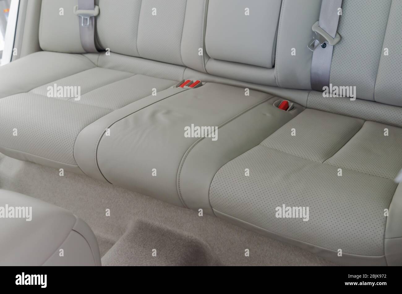 Car details - Modern cream leather car seat Stock Photo - Alamy
