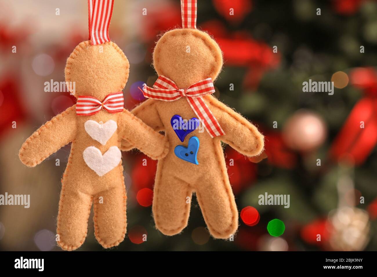 Soft toy men on blurred background Stock Photo - Alamy