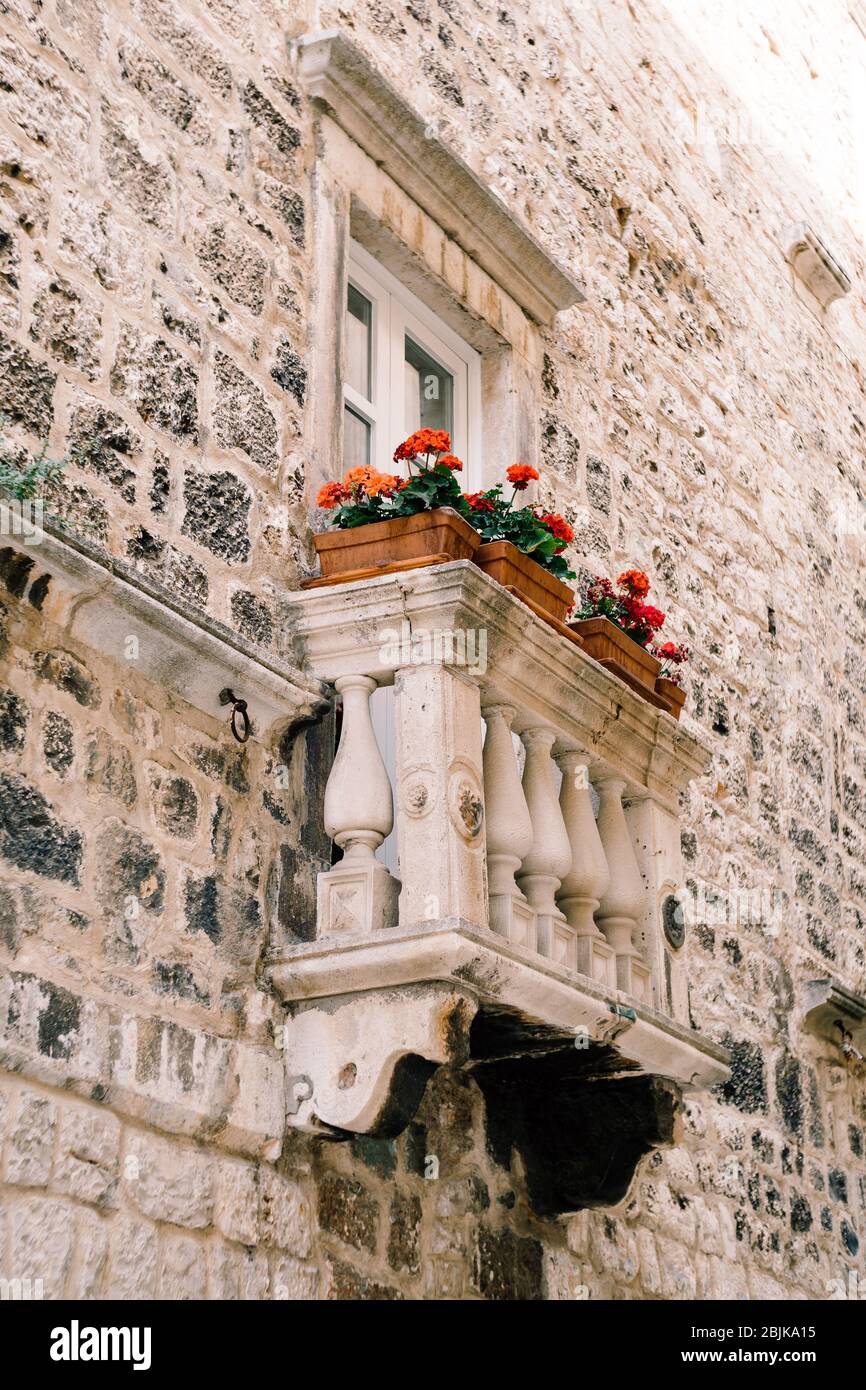 Old Venetian small balcony with white stone columns with beautiful ...