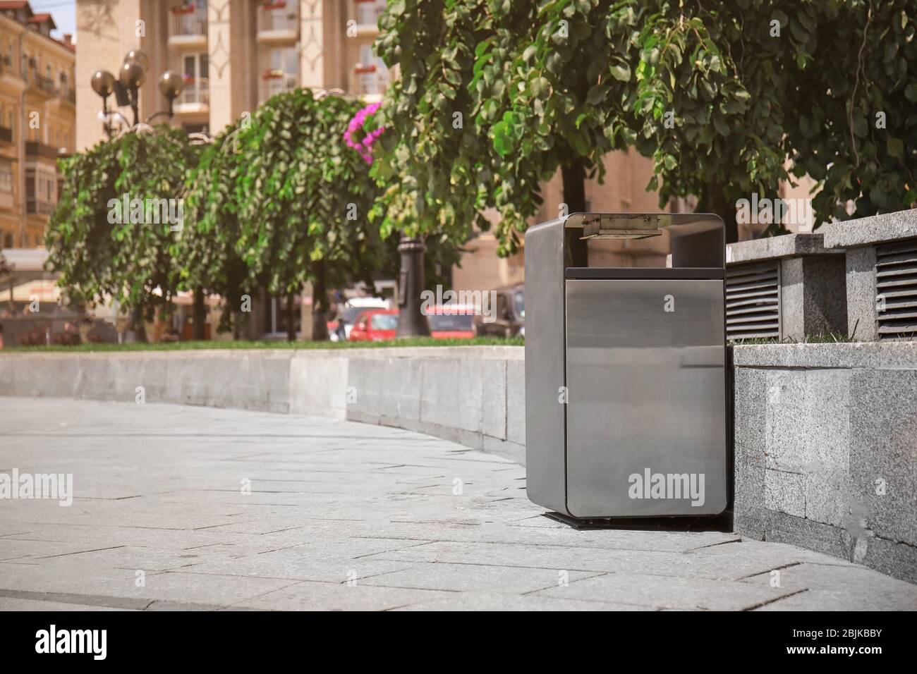 Modern trash bin, outdoors. Concept of environment preservation Stock ...