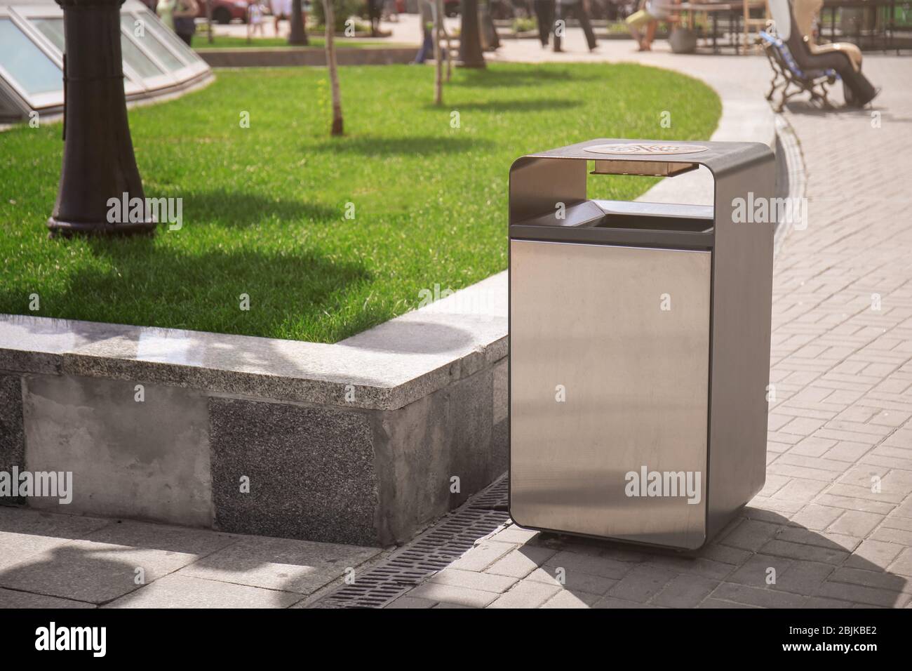 Modern trash bin, outdoors. Concept of environment preservation Stock ...