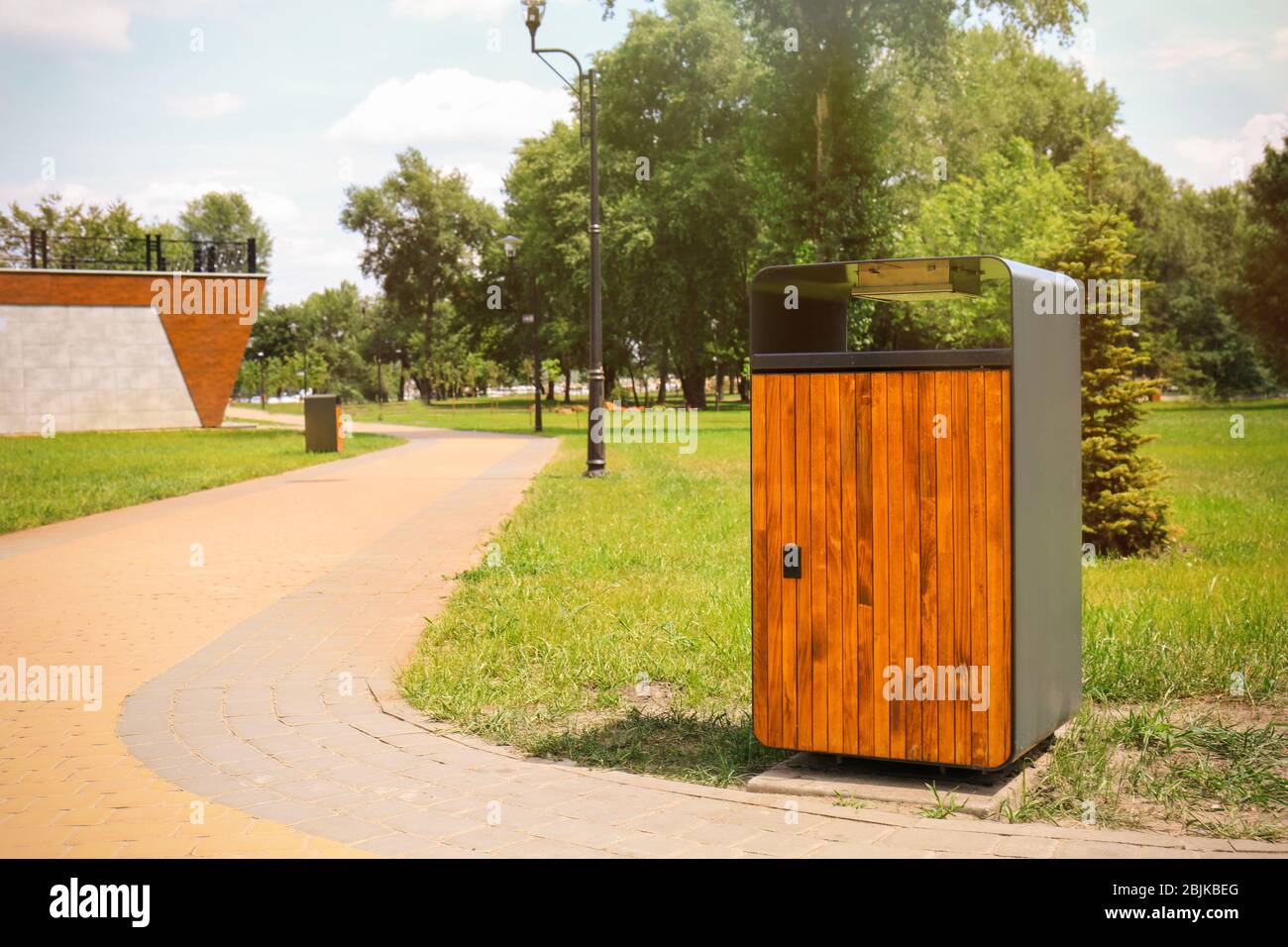 Modern trash bin in park. Concept of environment preservation Stock ...