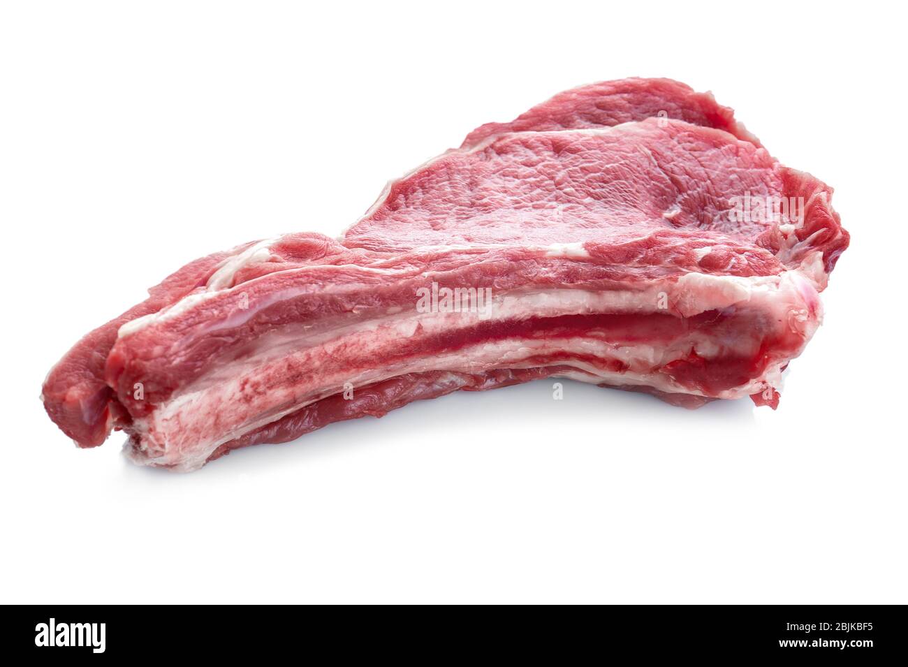 Raw rib eye steak on white background Stock Photo - Alamy