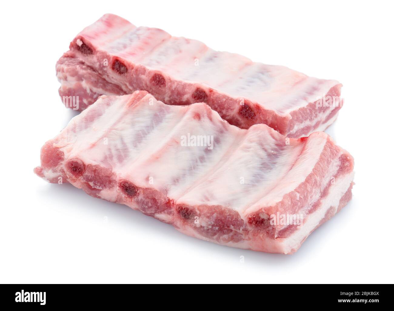 Raw ribs on white background Stock Photo - Alamy