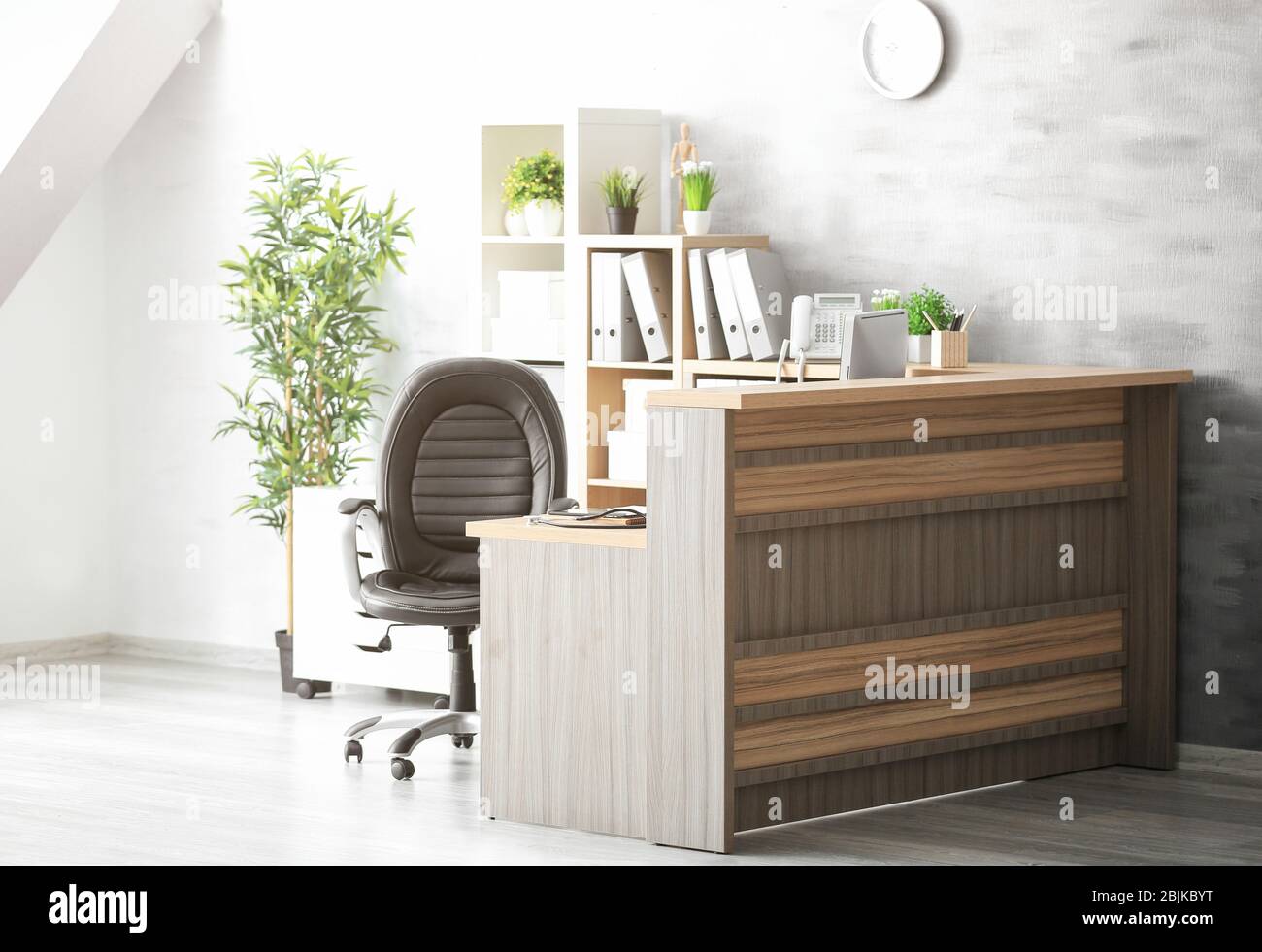 Empty reception desk indoors Stock Photo - Alamy