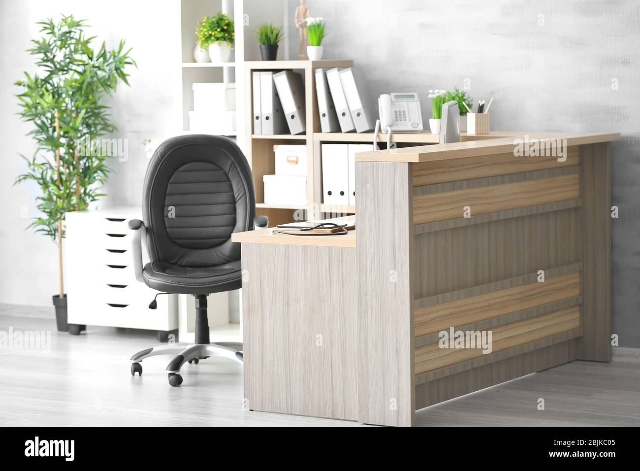 Empty reception desk indoors Stock Photo - Alamy