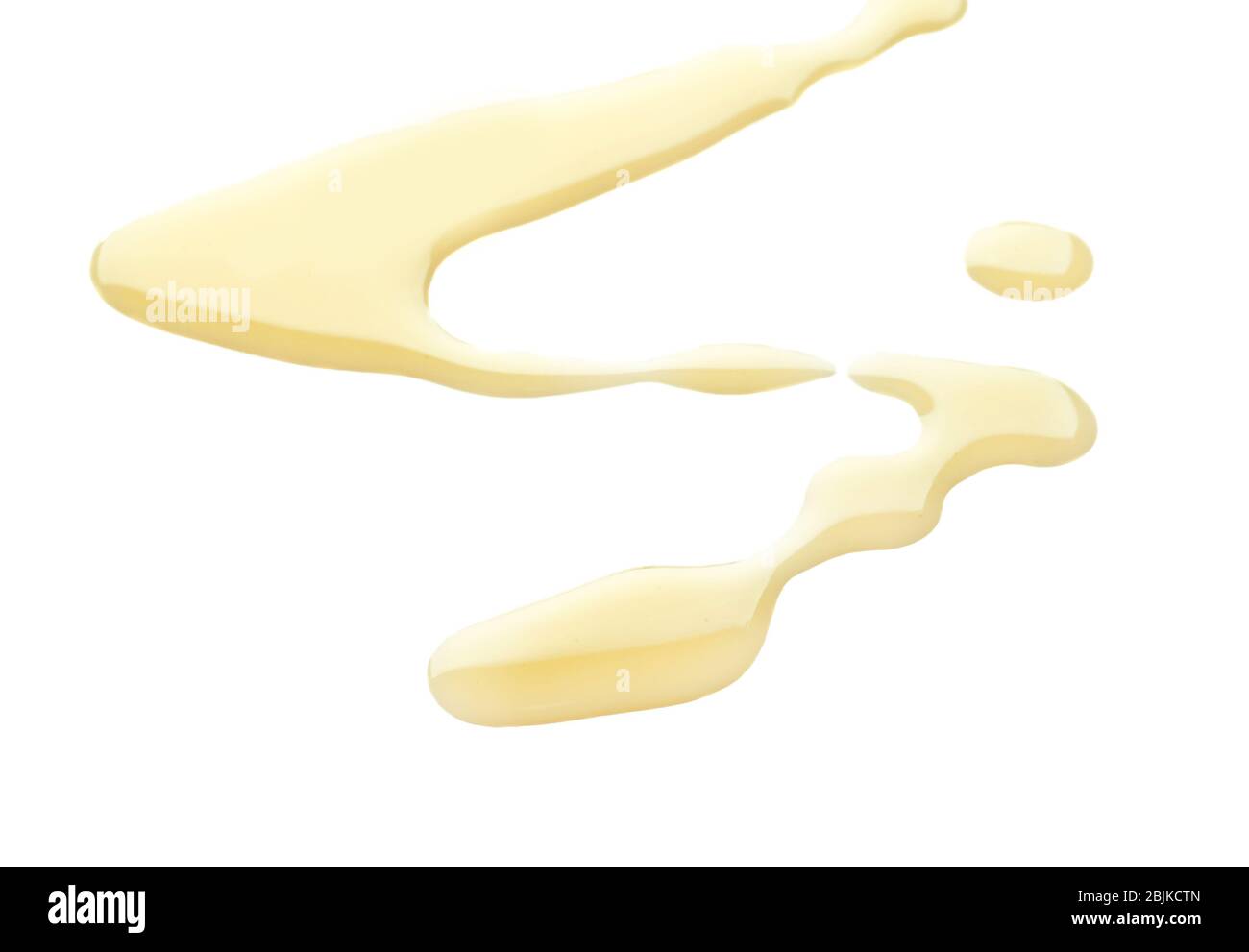 Spilled cooking oil on white background Stock Photo - Alamy