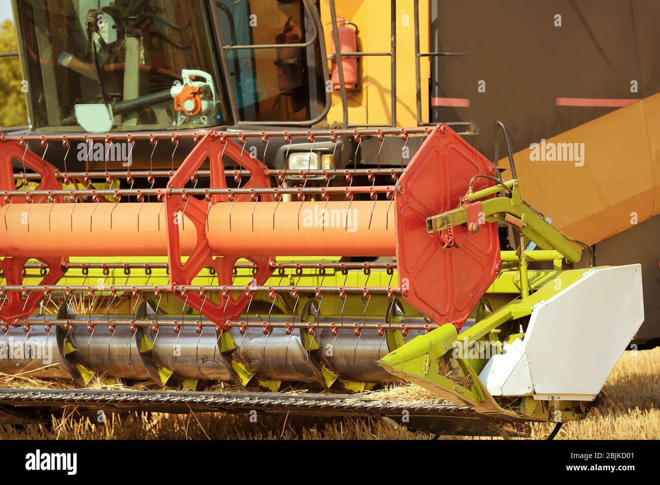 Combine harvester in field Stock Photo - Alamy