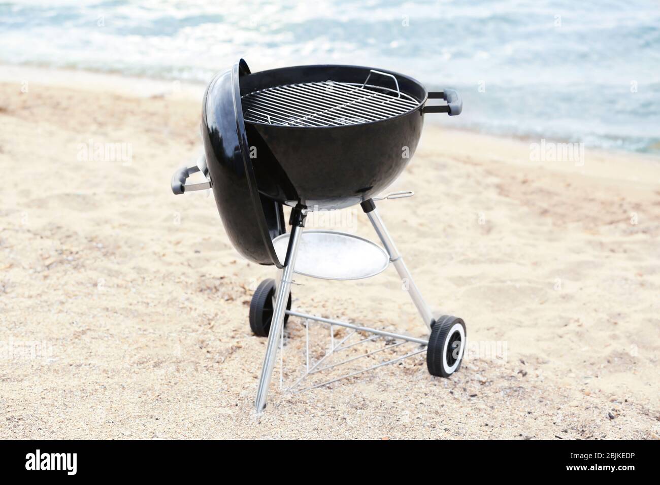 Barbecue grill on beach Stock Photo - Alamy