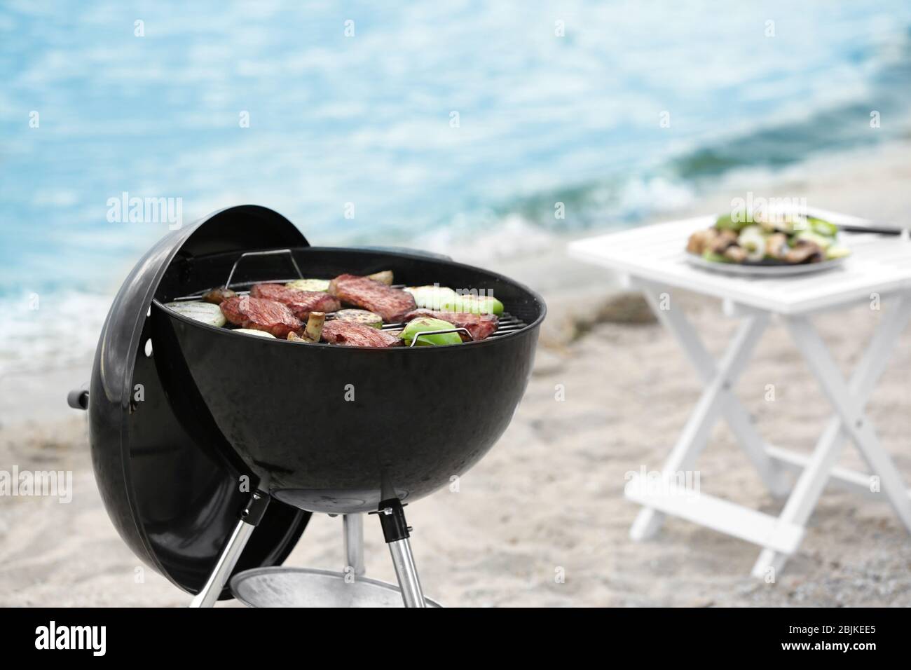 Portable barbecue beach hi-res stock photography and images - Alamy