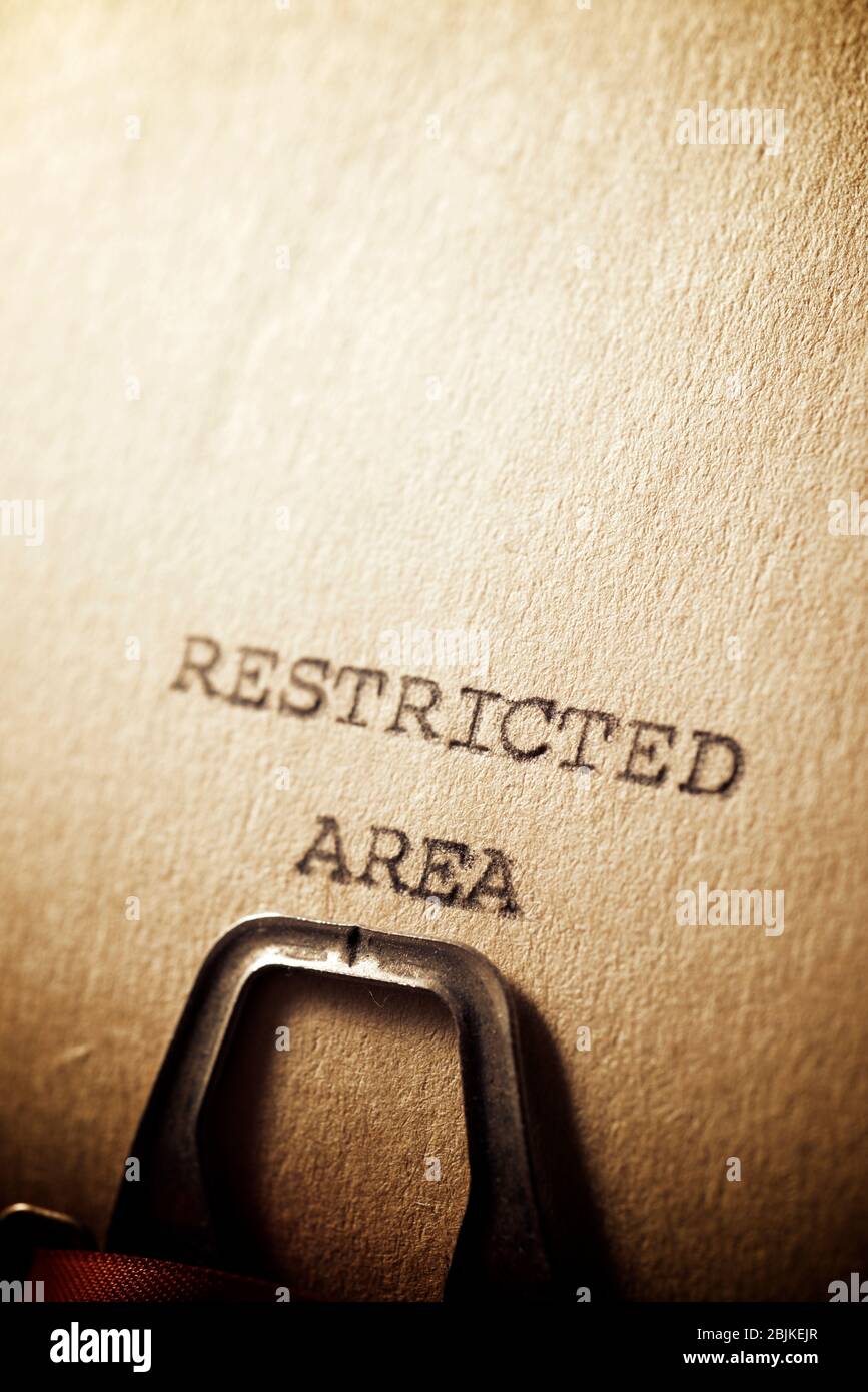Restricted area text written on a paper Stock Photo - Alamy