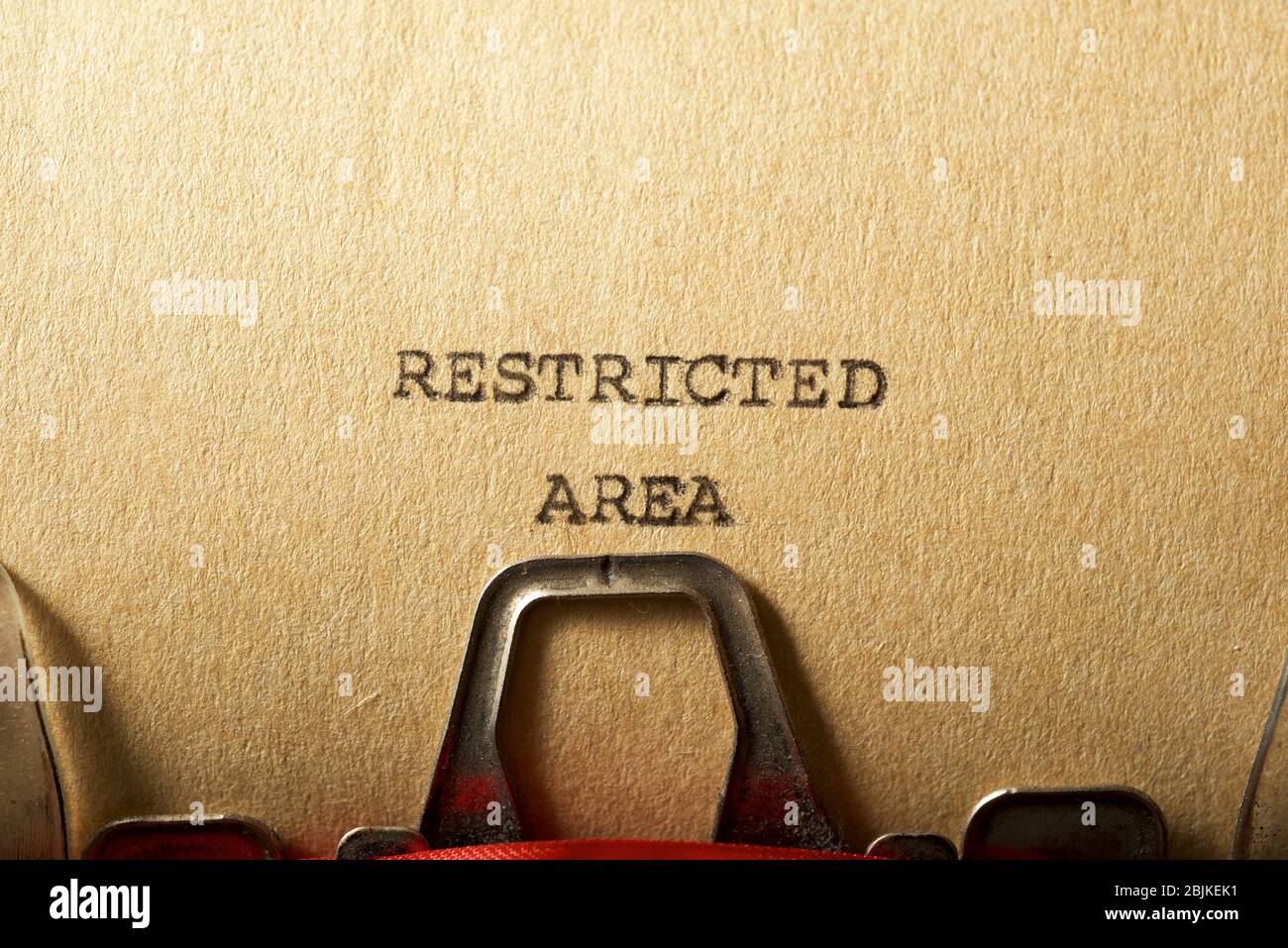 Restricted area text written on a paper Stock Photo - Alamy