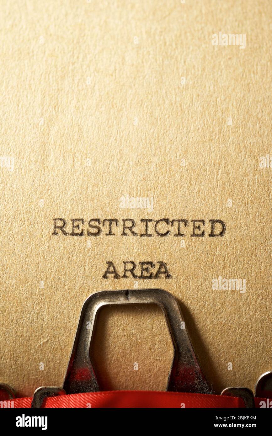 Restricted area text written on a paper Stock Photo - Alamy