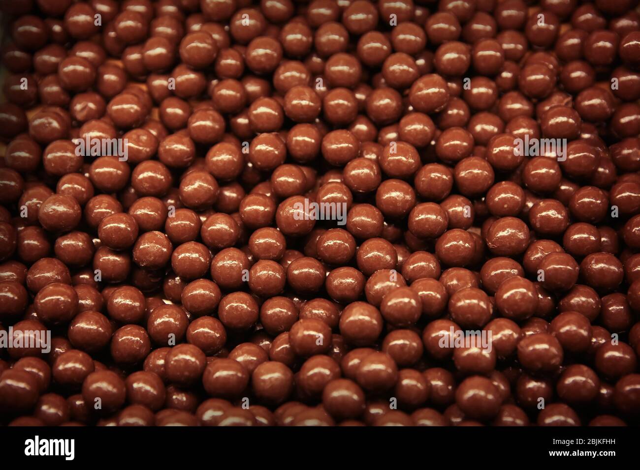 Closeup of chocolate dragees as background Stock Photo - Alamy