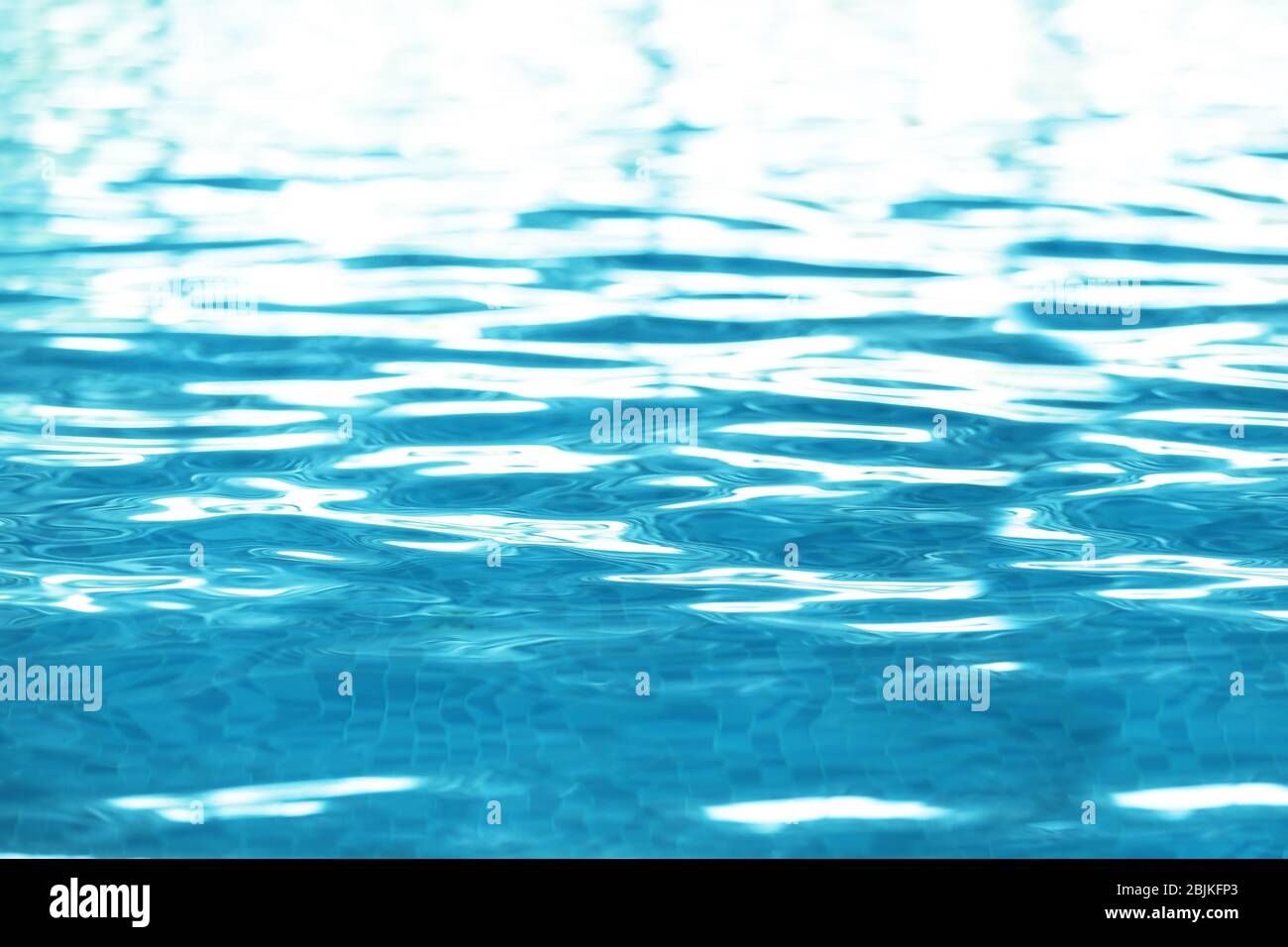Blue clean water in swimming pool Stock Photo - Alamy