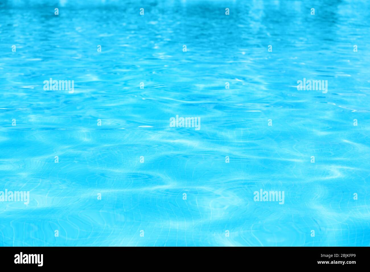 Blue clean water in swimming pool Stock Photo - Alamy