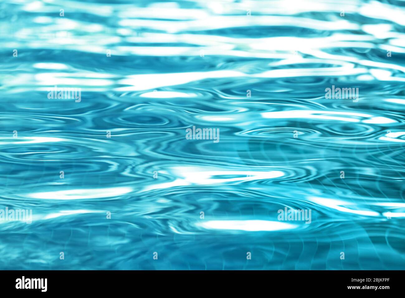 Blue clean water in swimming pool Stock Photo - Alamy