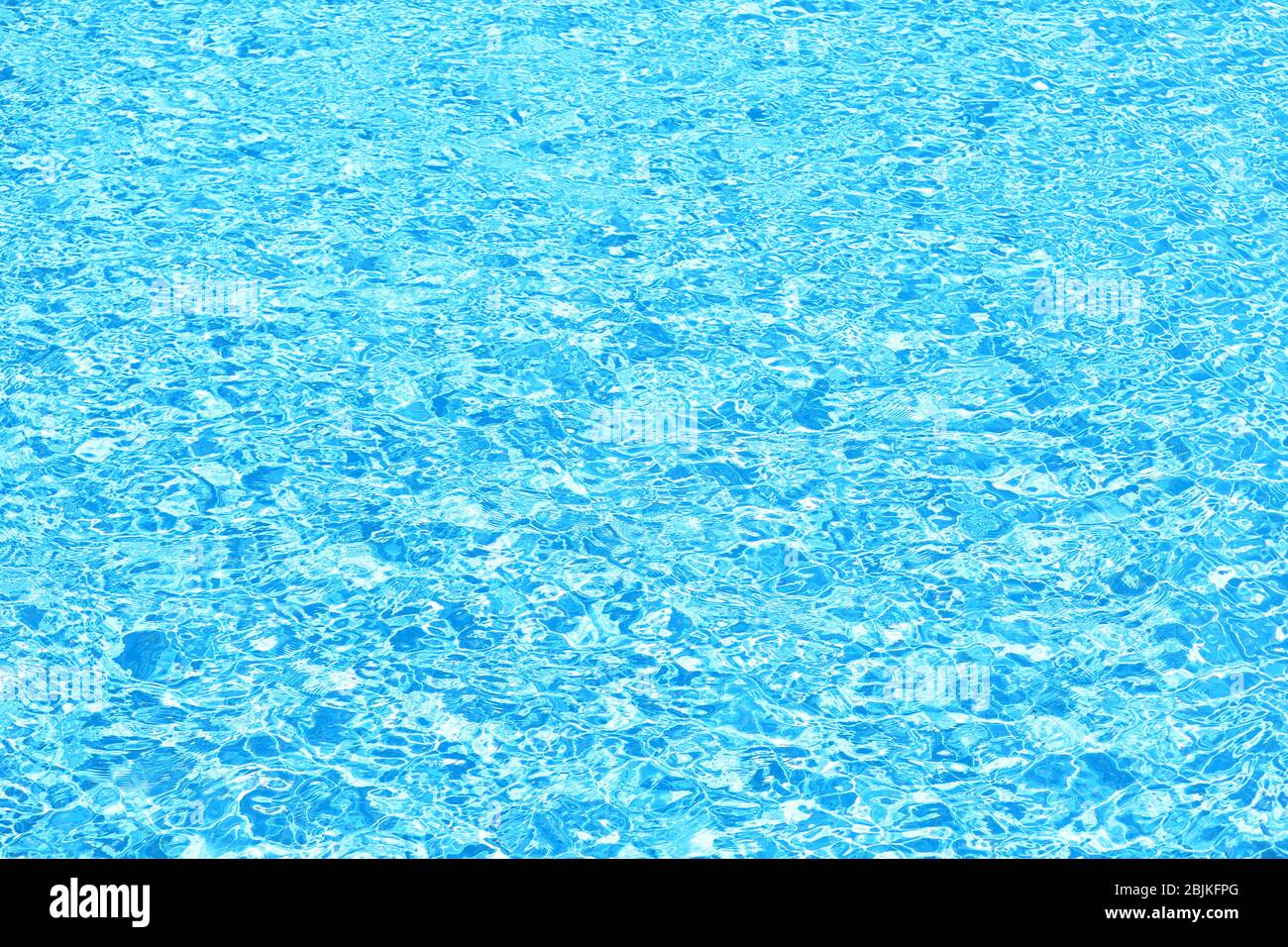 Blue clean water in swimming pool Stock Photo - Alamy