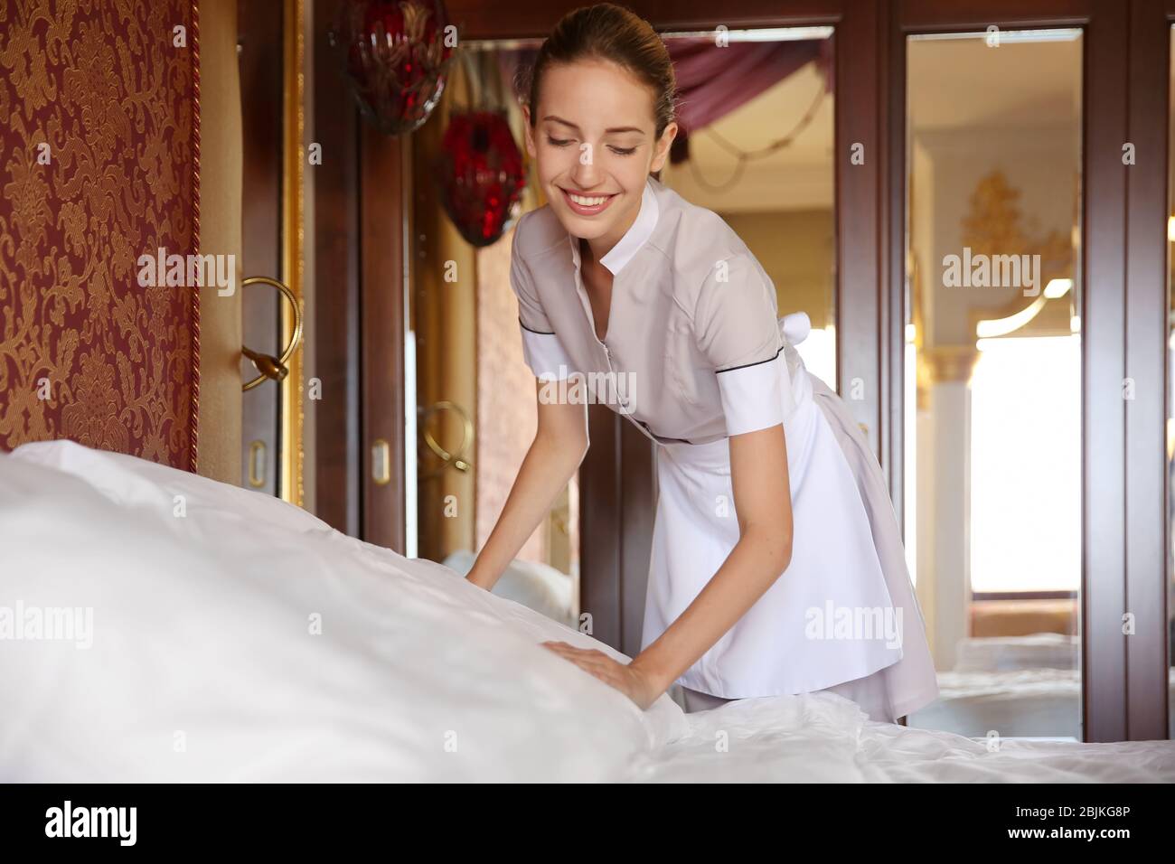 Beautiful hotel maid making hi-res stock photography and images - Alamy