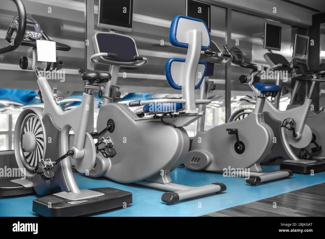 Interior of modern gym with machines Stock Photo - Alamy