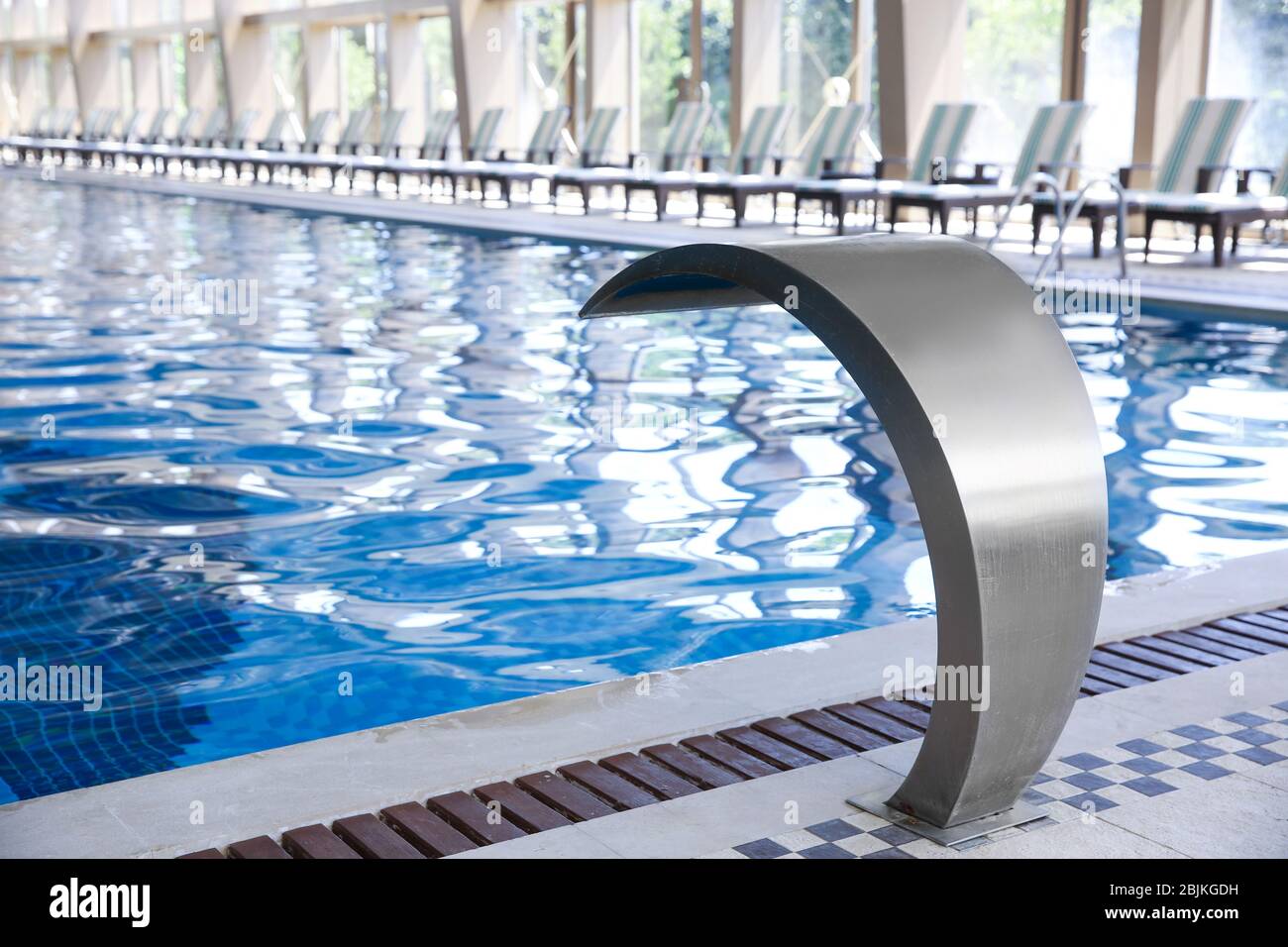 Indoor swimming pool in modern hotel Stock Photo - Alamy