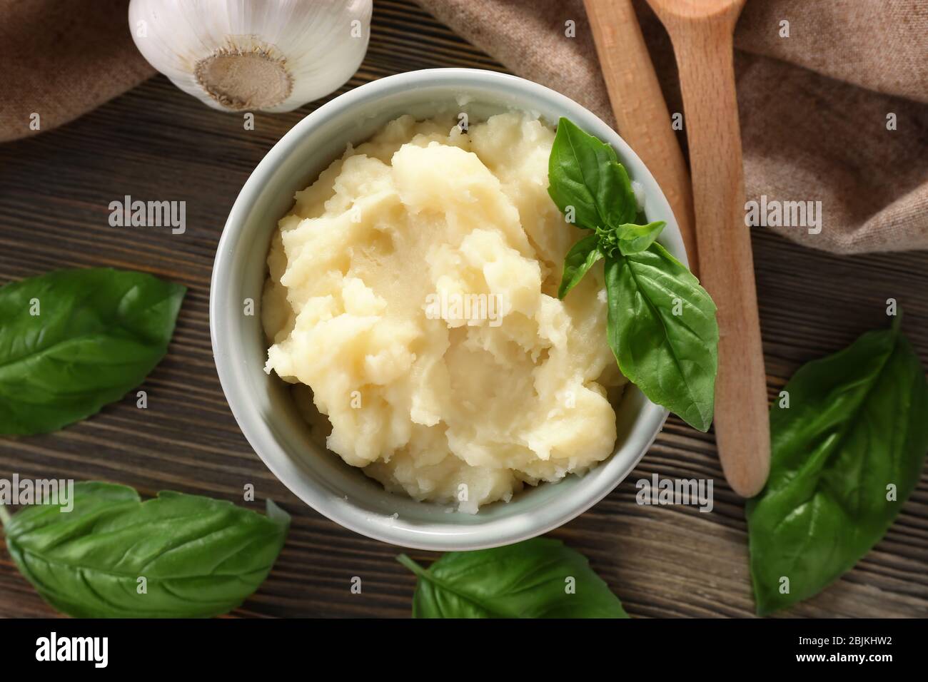 Mashed potatoes in bowl on table Stock Photo - Alamy