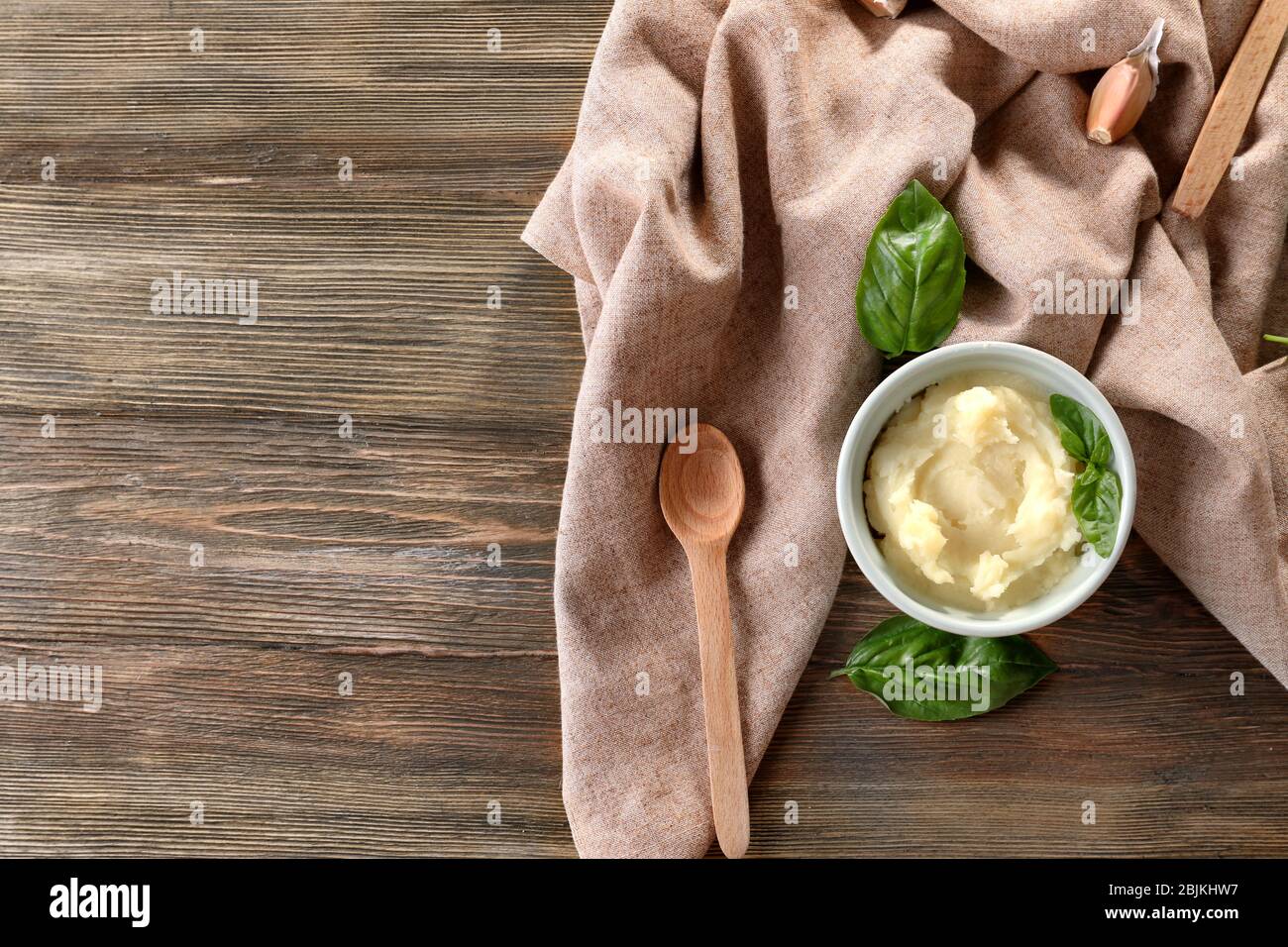 Composition with mashed potatoes in bowl on wooden table Stock Photo ...