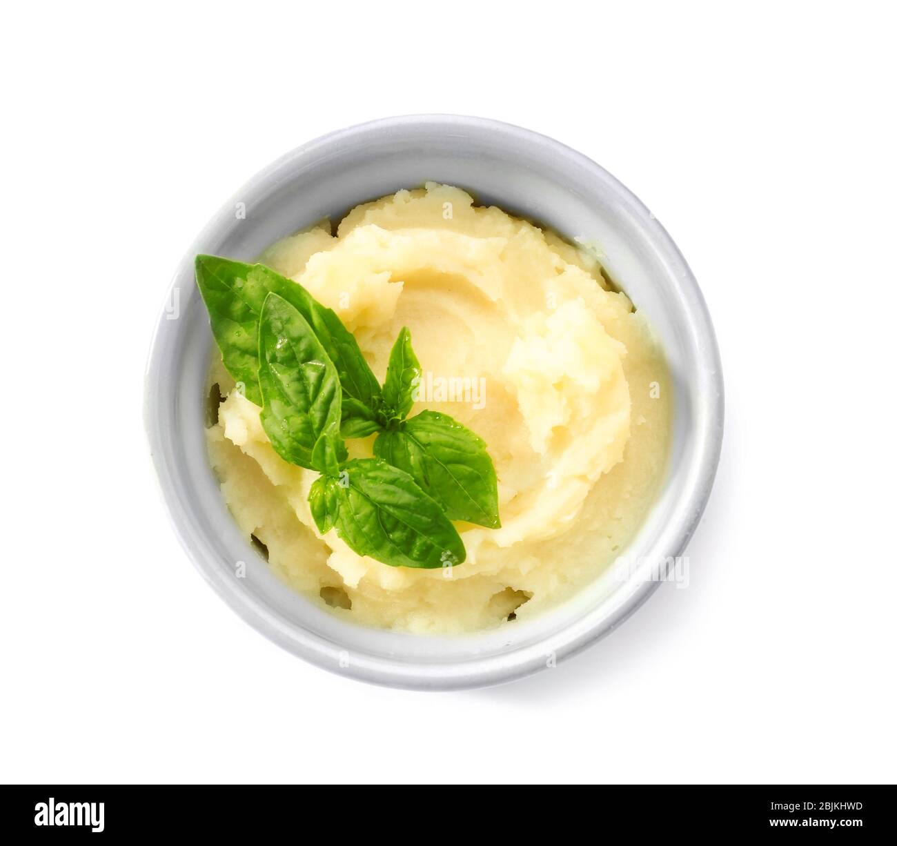 Mashed potatoes in bowl, isolated on white Stock Photo - Alamy