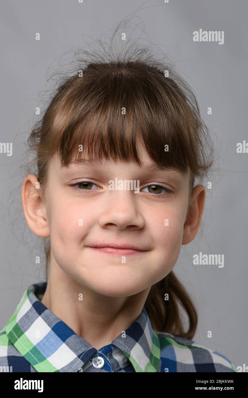 Portrait of a self-confident ten-year-old girl of European appearance ...