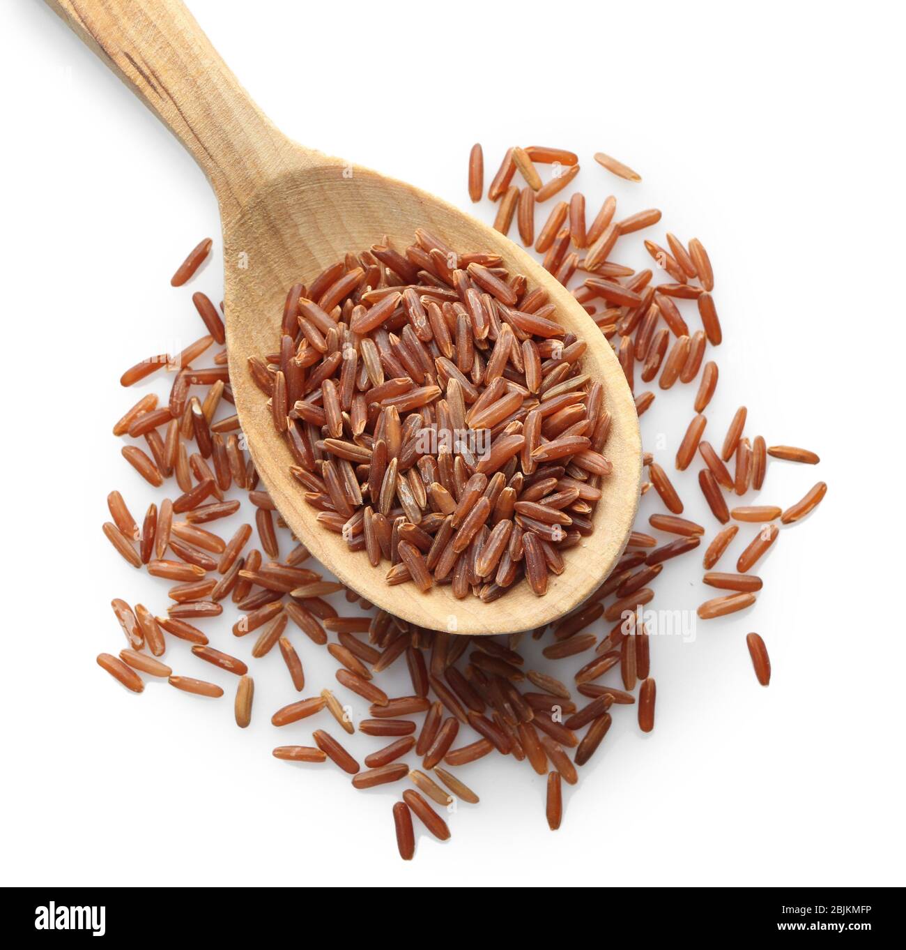 Wooden spoon with red Cargo rice on white background Stock Photo - Alamy