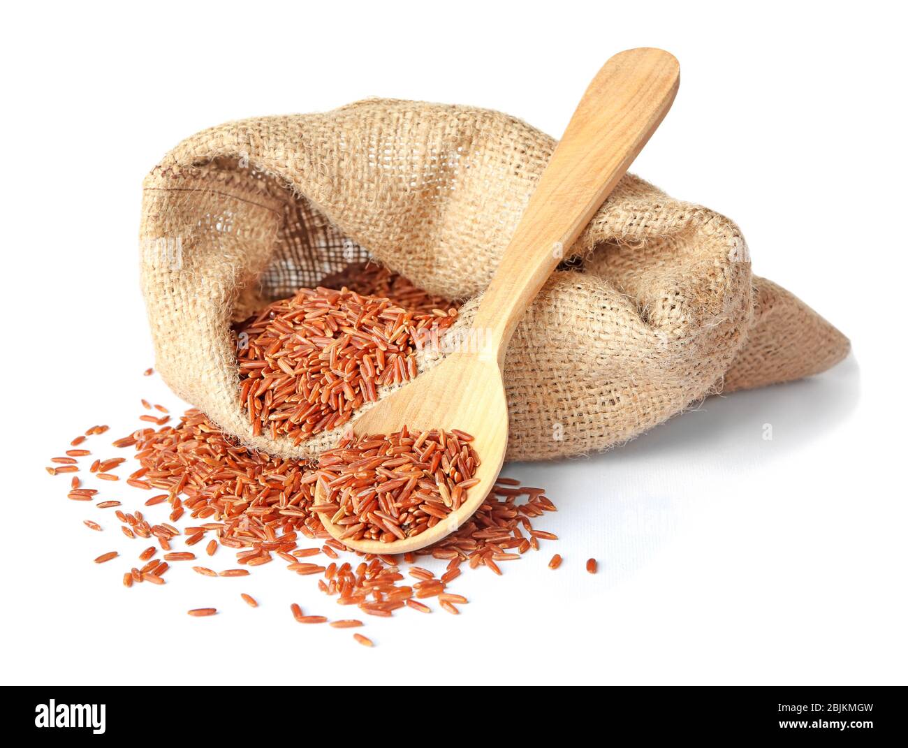 Bag and spoon with red Cargo rice on white background Stock Photo - Alamy