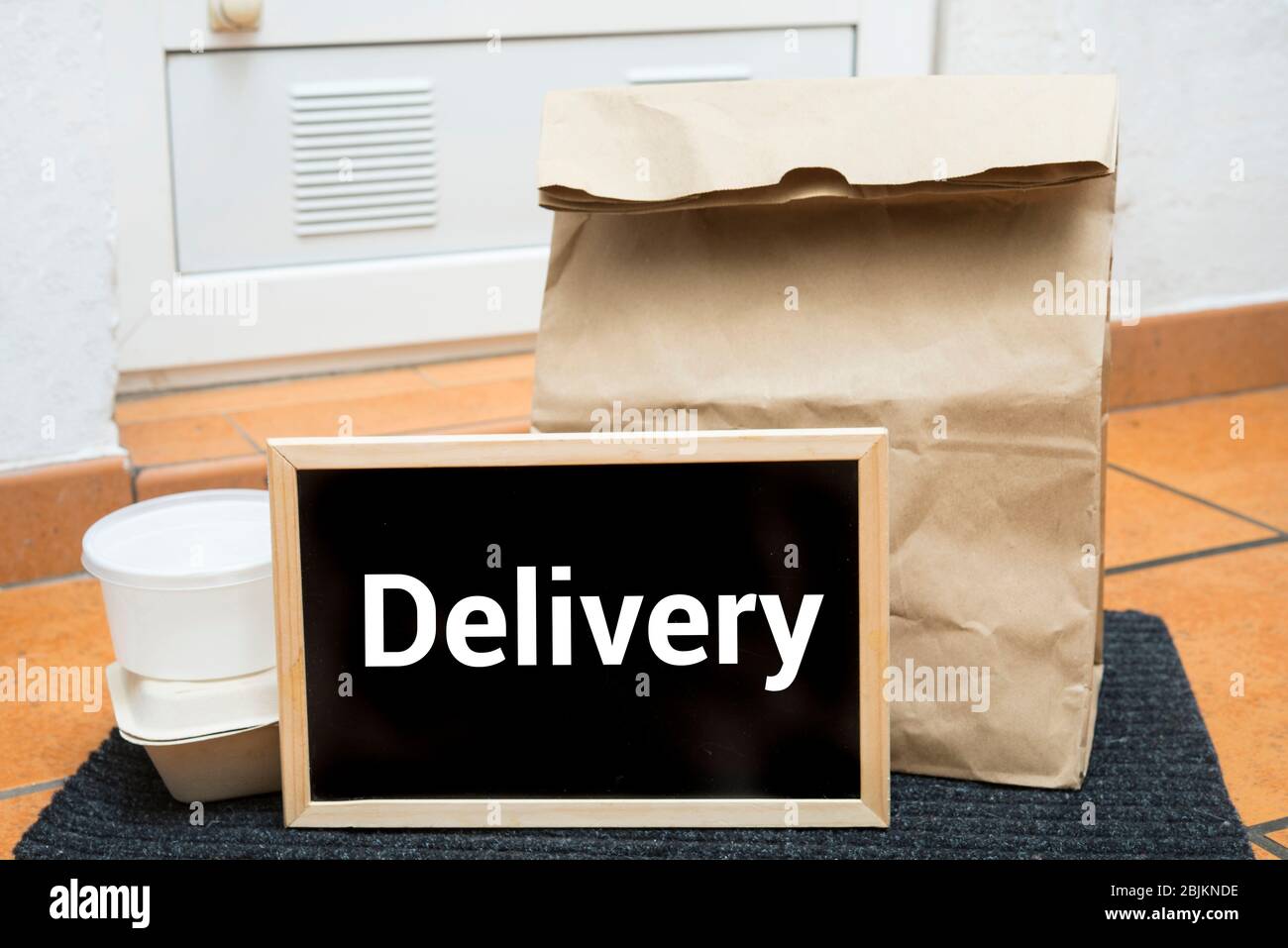 home delivery service, boxes standing by the house doors Stock Photo ...