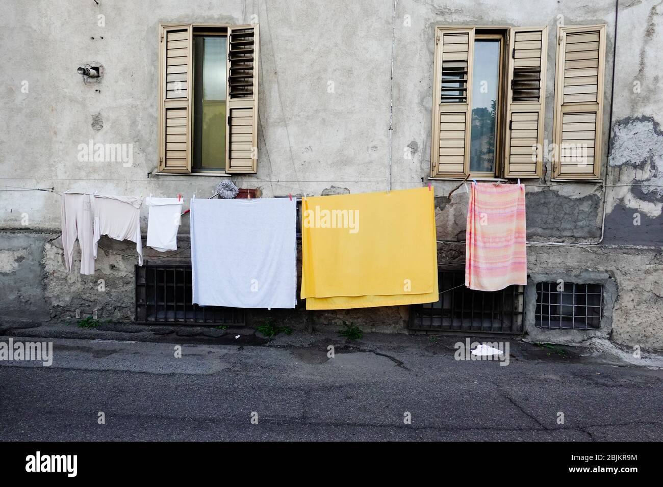 Hanging street clothesline hi-res stock photography and images - Alamy