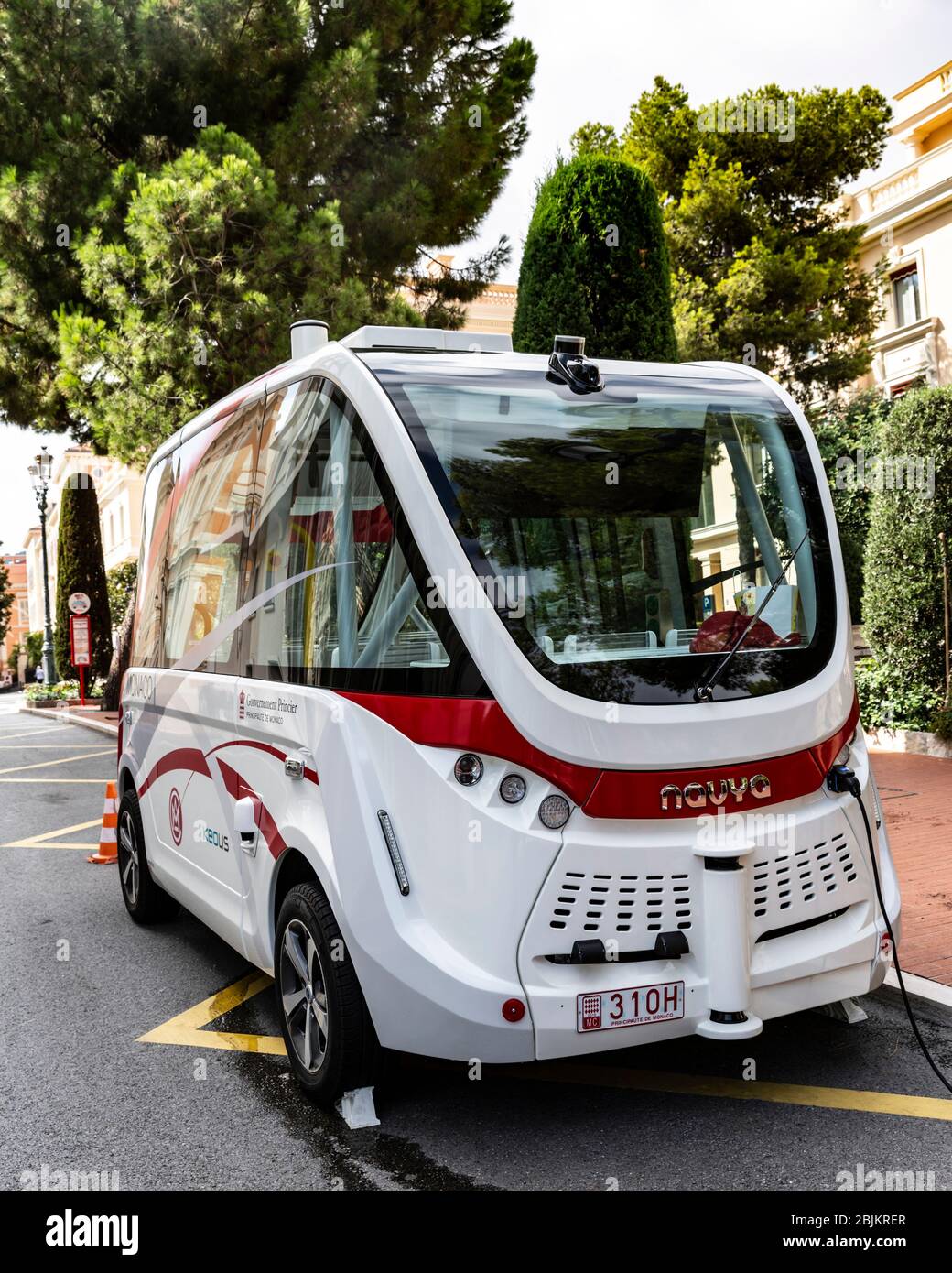 Autonomous electric driverless bus being recharged, Principality of ...