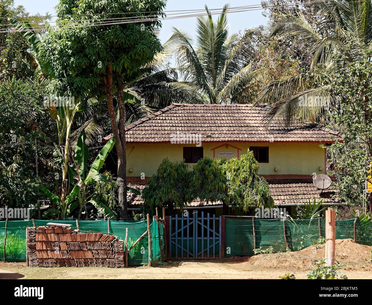 Traditional tiled roof house in Karnataka Stock Photo - Alamy