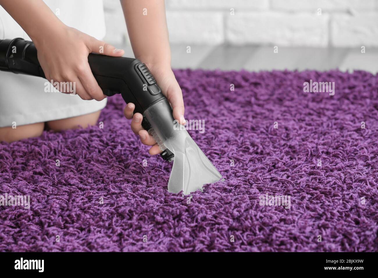 Person using steam cleaner hi-res stock photography and images - Alamy