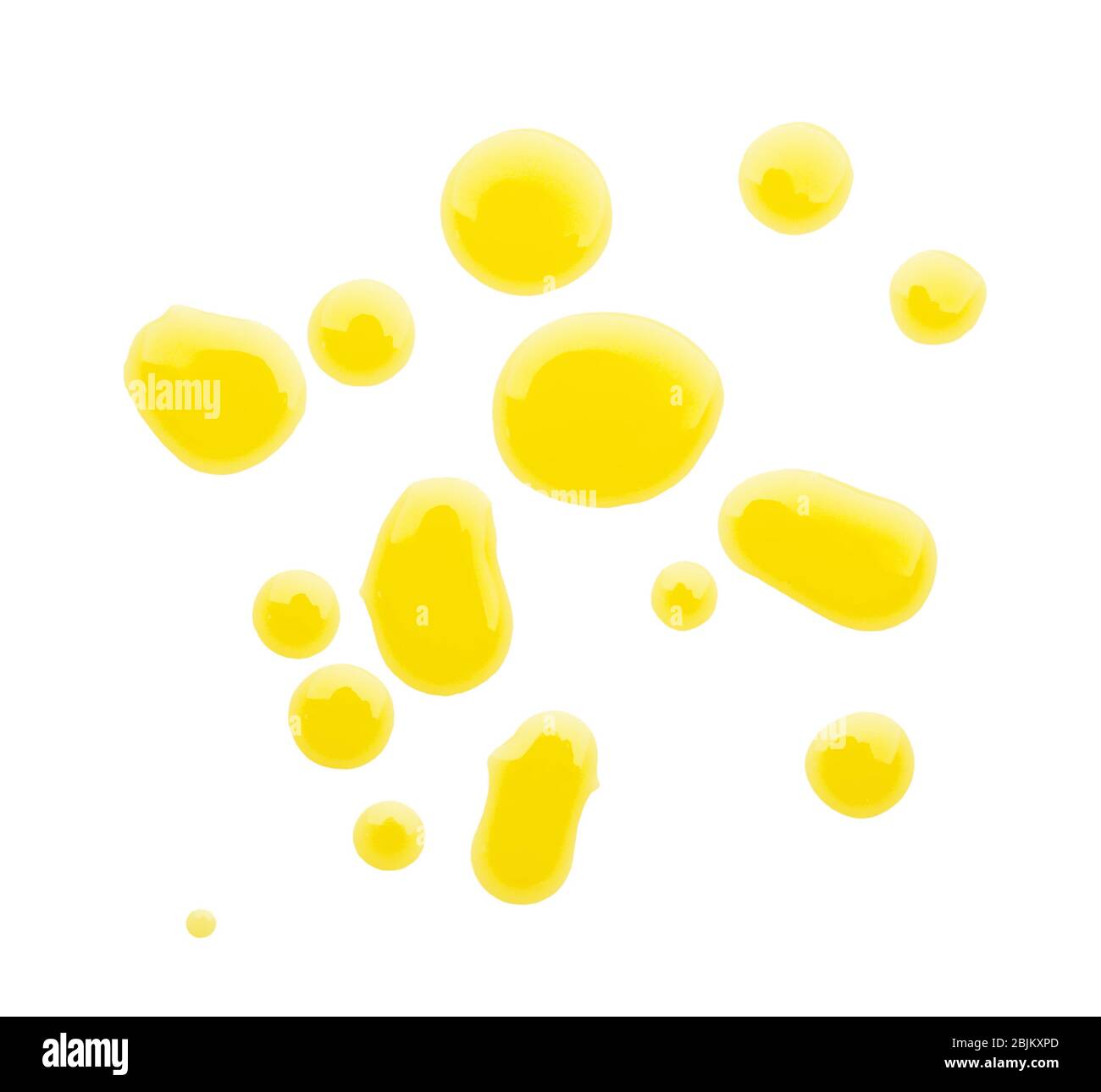 Spots of olive oil isolated on white Stock Photo - Alamy