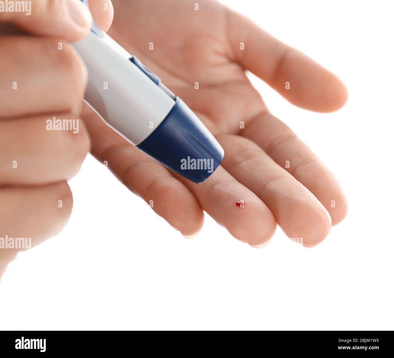 Woman taking blood sample with lancet pen on white background. Diabetes ...
