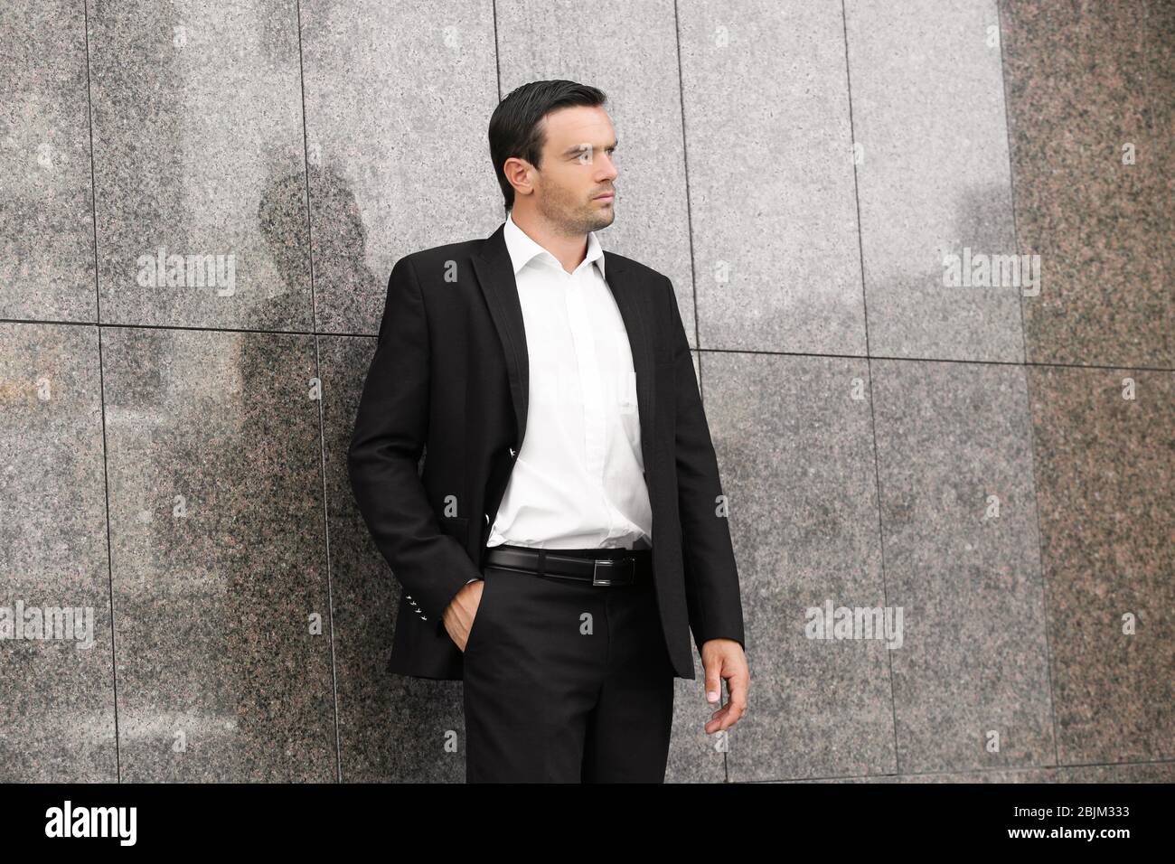Man standing near marble hi-res stock photography and images - Alamy