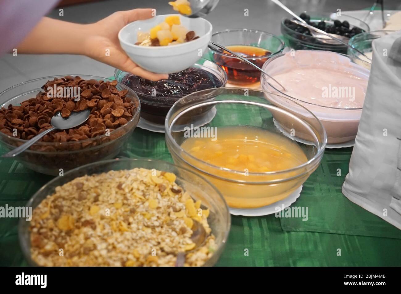 Bowls with different food in buffet Stock Photo - Alamy
